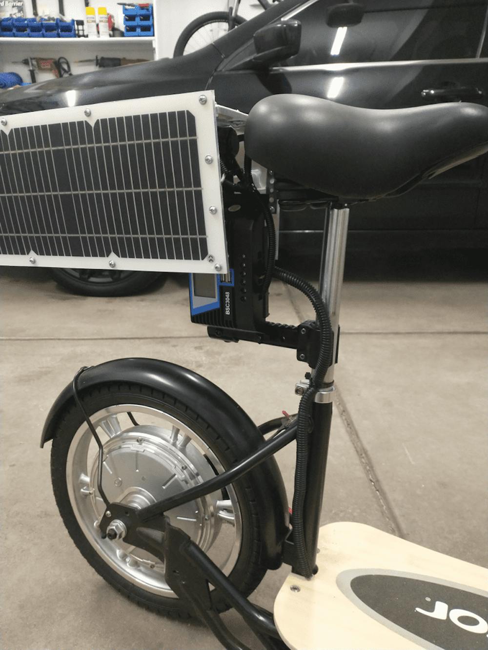 Solar scooter brackets made of 1" emt and maker pi...