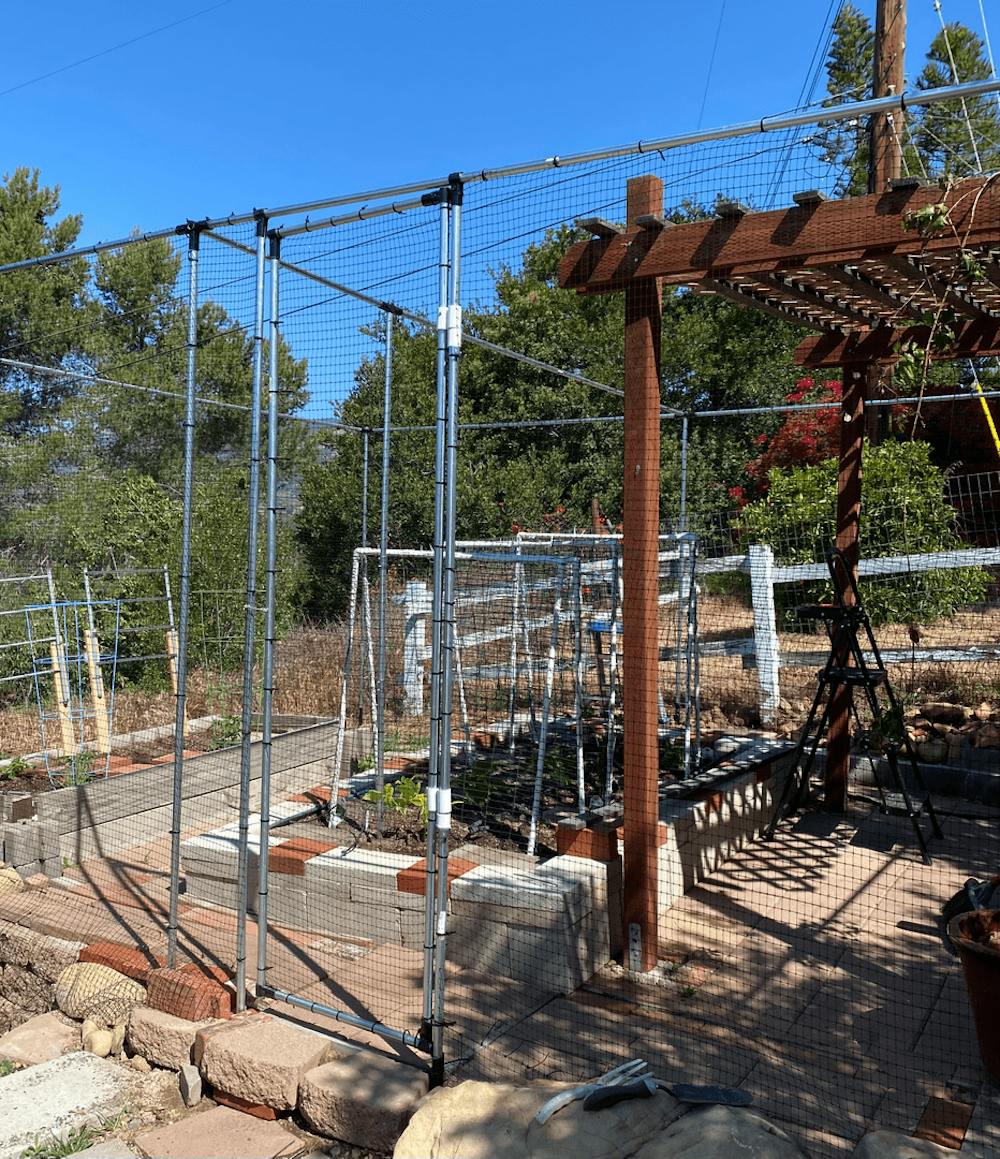 Gated garden enclosure, maker pipe & deer fencing