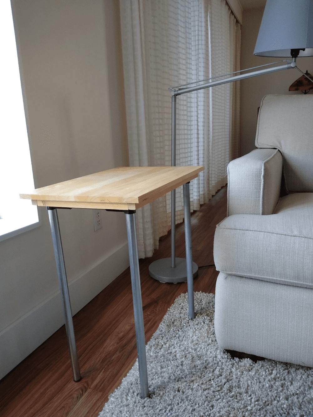 This is a simple side table for a small space. In...