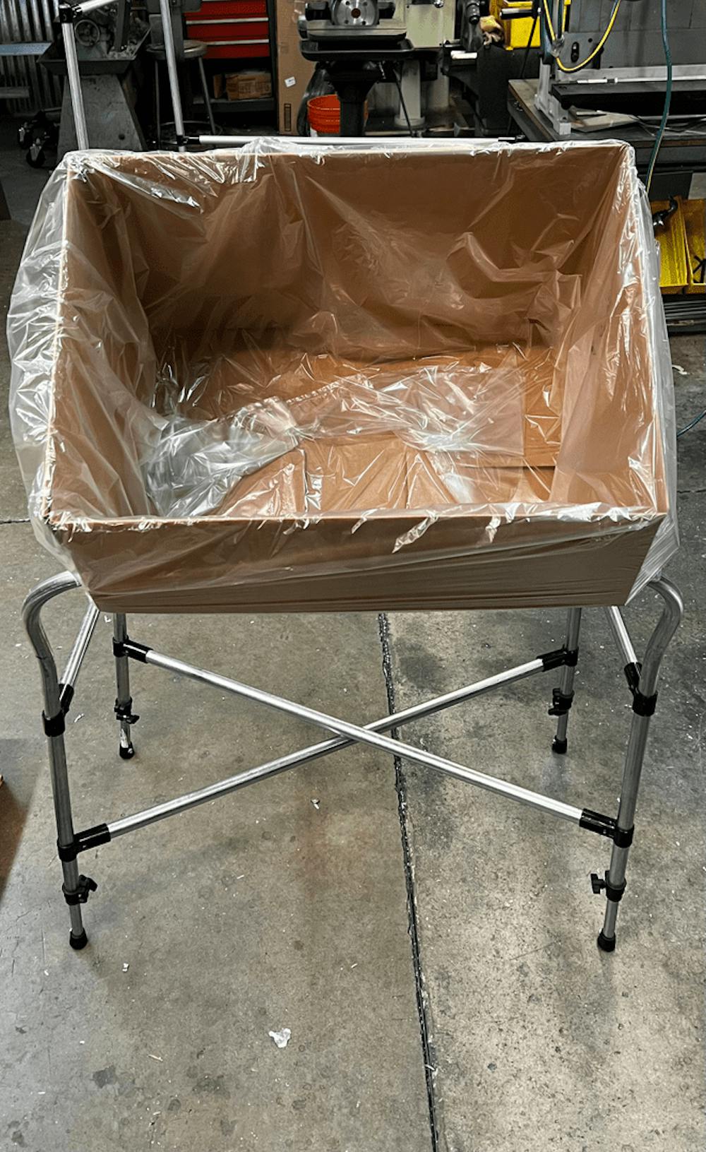 Here is a cool adjustable box stand put together f...