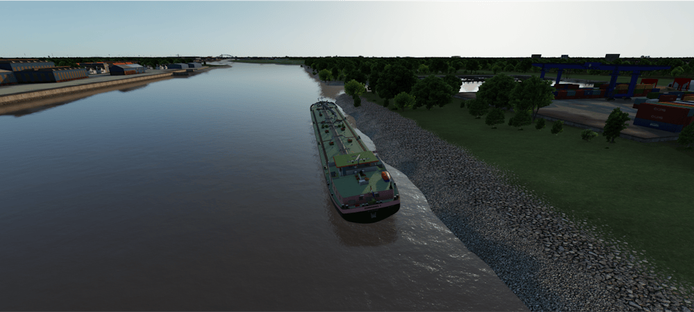 Zonnedael lousily parked at the side of a river