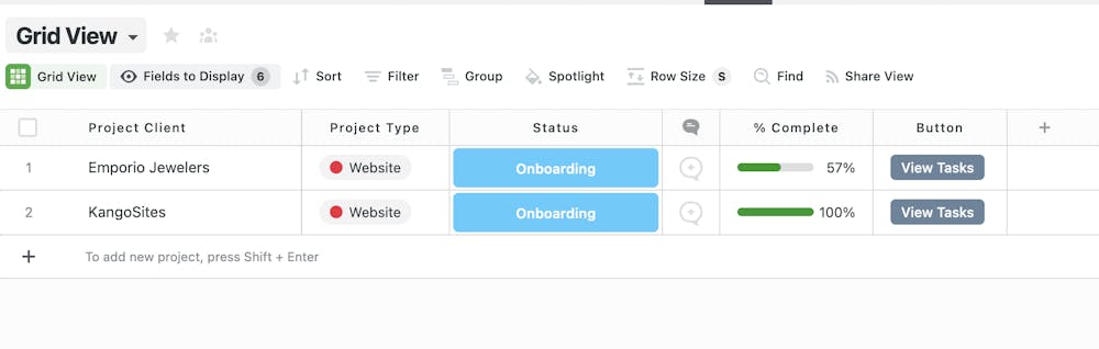 Can you link a button to a saved filtered grid view?