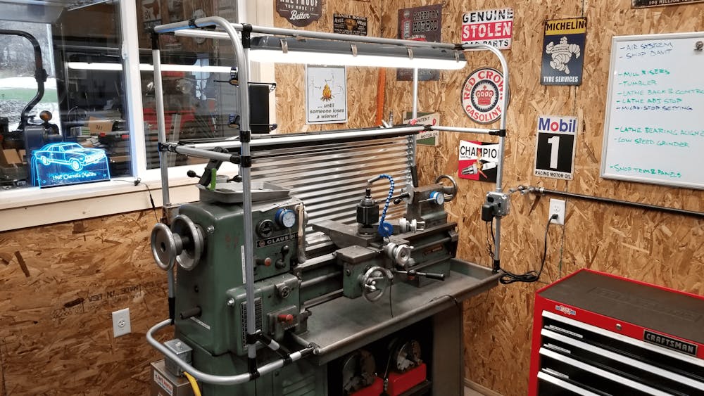 😎 Clausing lathe frame structure with chip backsto...