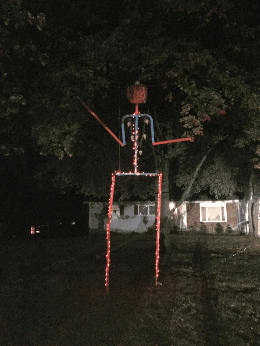 Halloween stick figure pumpkin.